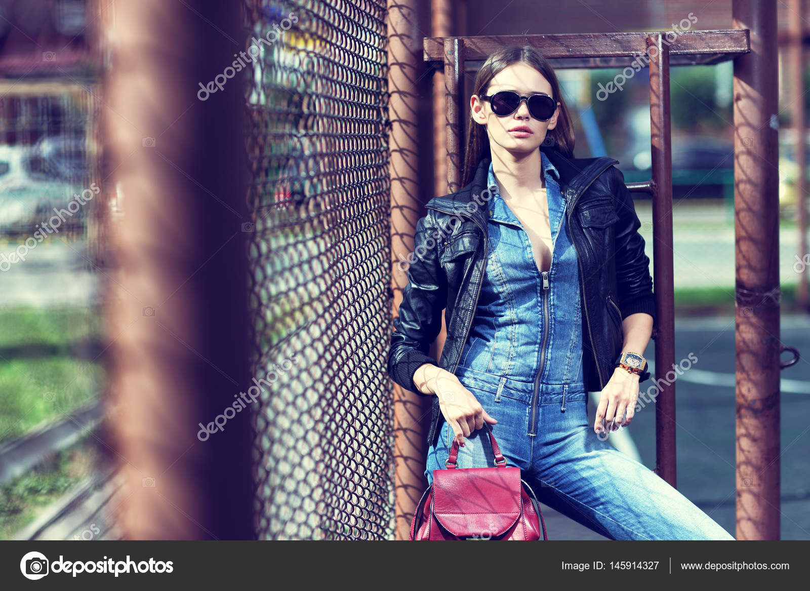 Woman wearing jeans overall — Stock Photo © MaxFrost #145914327