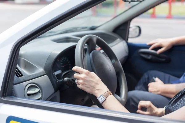 Senior learning to drive a car with a driving instructor - Stock Image ...