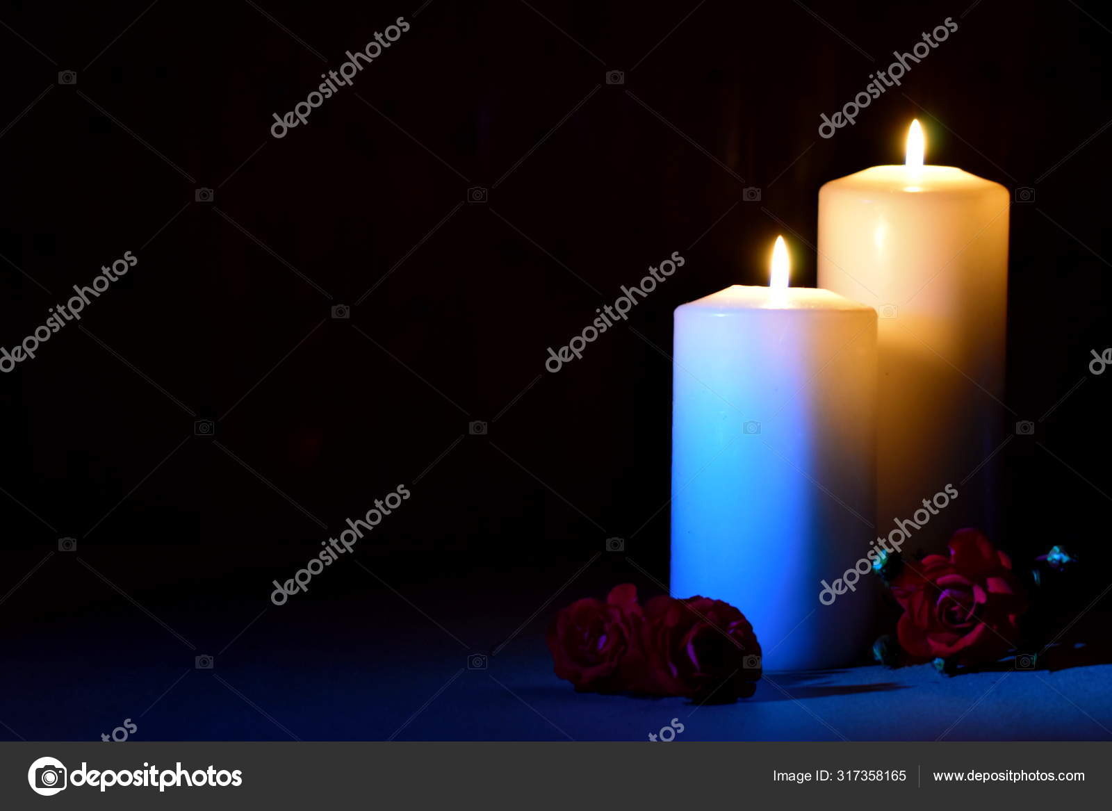 Day of memory and sorrow. Remember and mourn. Two white candles with ...