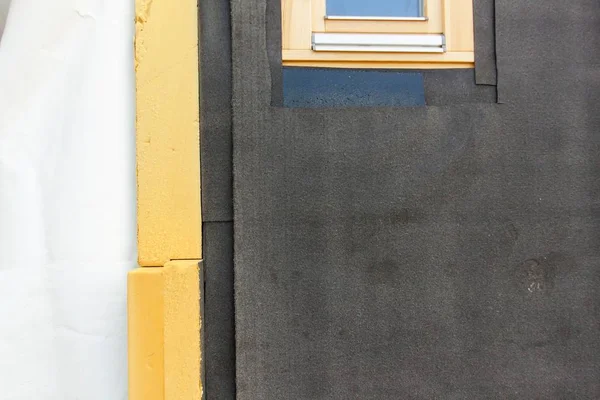 Polystyrene wall insulation for wooden buildings. Detail of the thermal ...