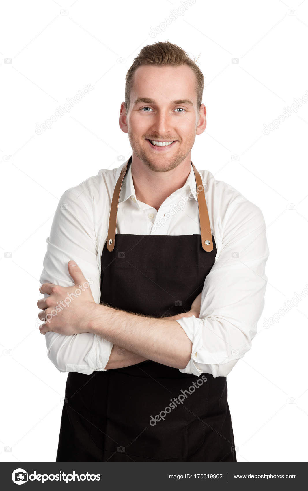 Good looking chef in black apron Stock Photo by ©-Robbie- 170319902