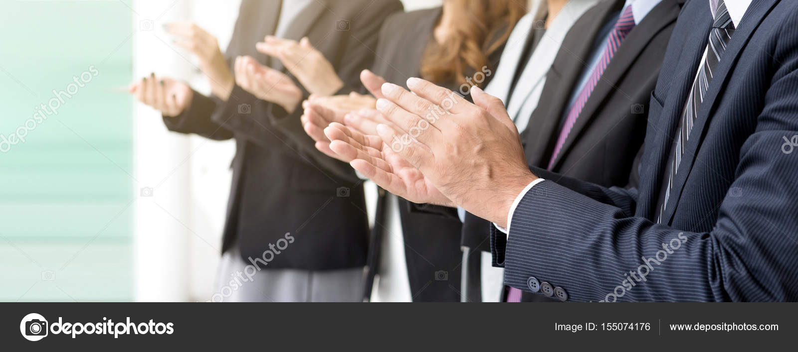 Business people clapping their hands Stock Photo by ©kritchanut 155074176