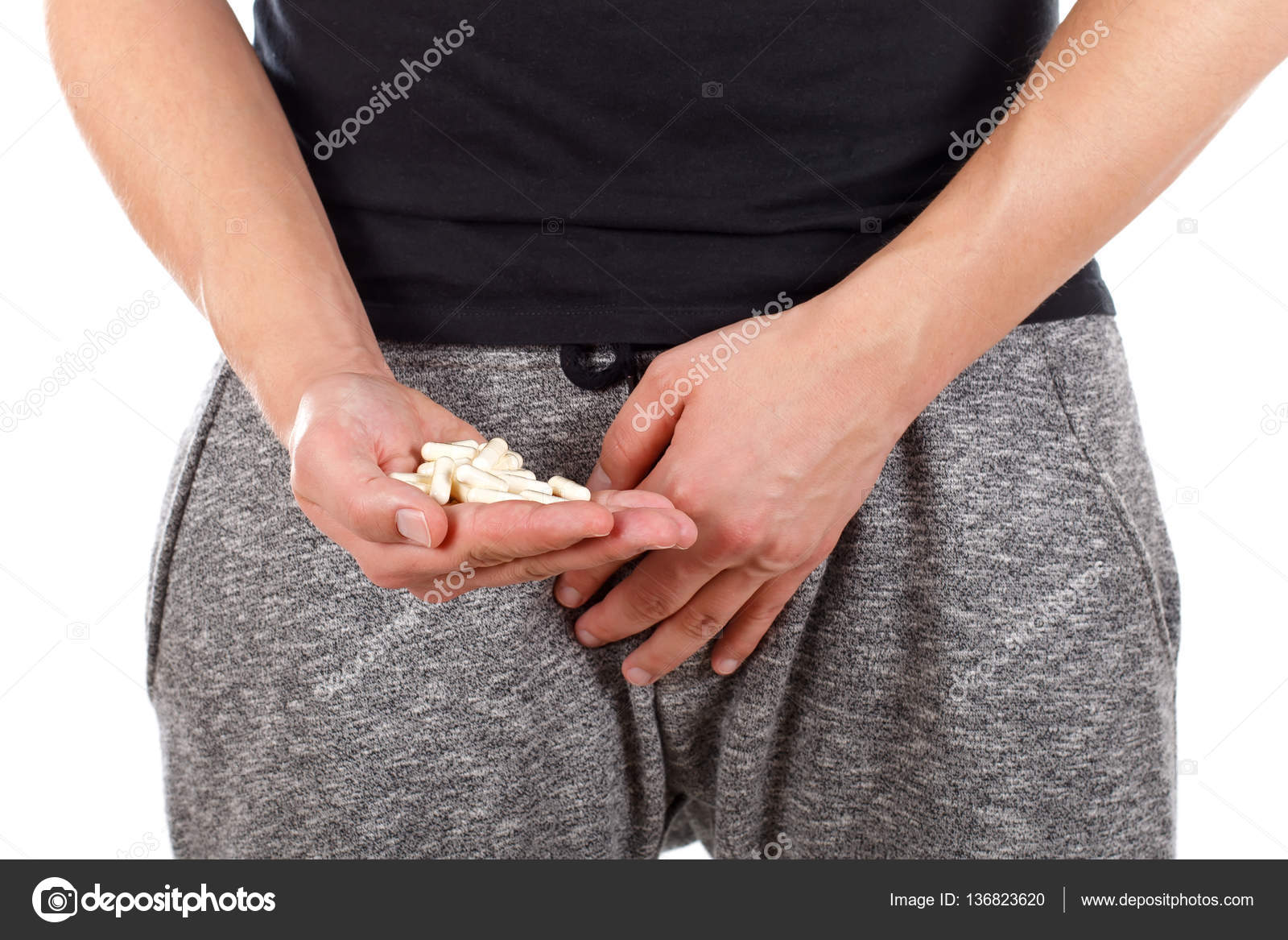 Young man has erection problems Stock Photo by ©ocskaymark 136823620