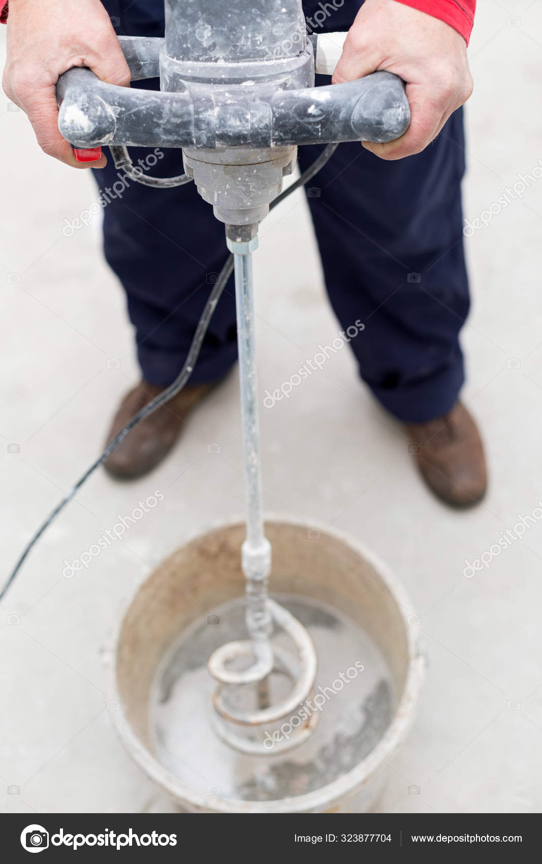 Electric mortar mixer Stock Photo by ©ocskaymark 323877704