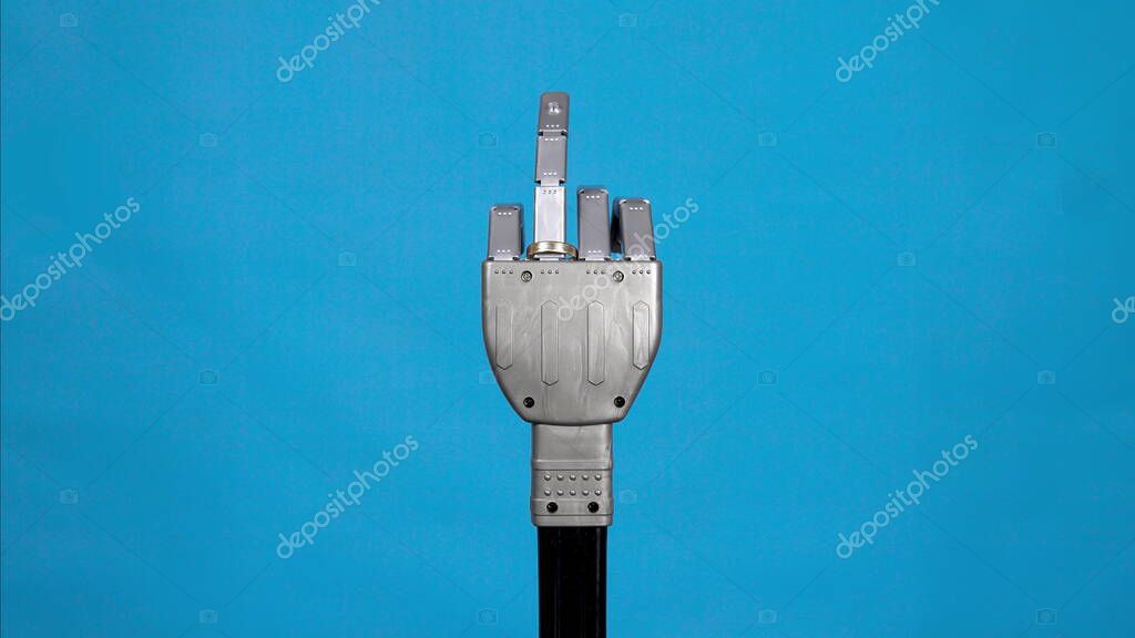 Un brazo mecánico dobla los dedos y muestra un dedo anular con un ...