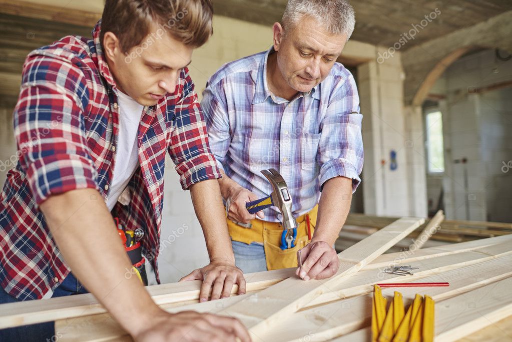 Manual workers at building object — Stock Photo © gpointstudio #128142374