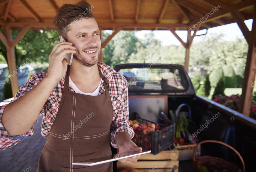 Man farmer on his field — Stock Photo © gpointstudio #128298966