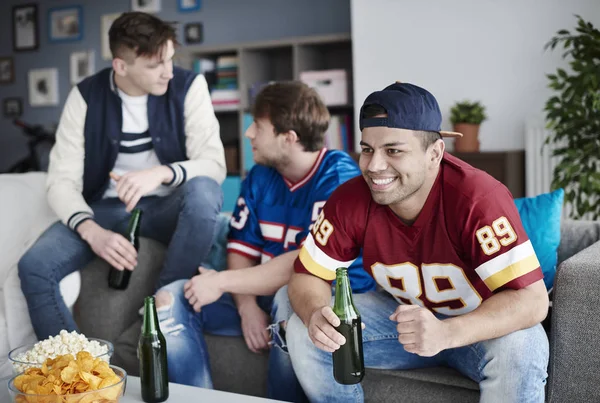 Friends cheering for team Stock Photo by ©gpointstudio 140305476