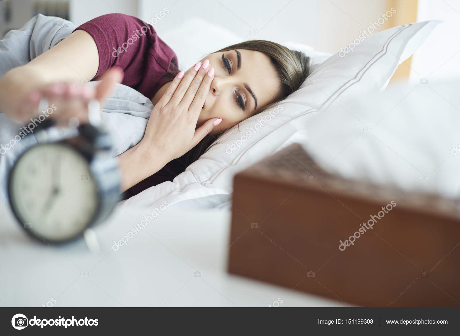 Young woman waking up — Stock Photo © gpointstudio #151199308 Young woman waking up — Stock Photo © gpointstudio #151199308