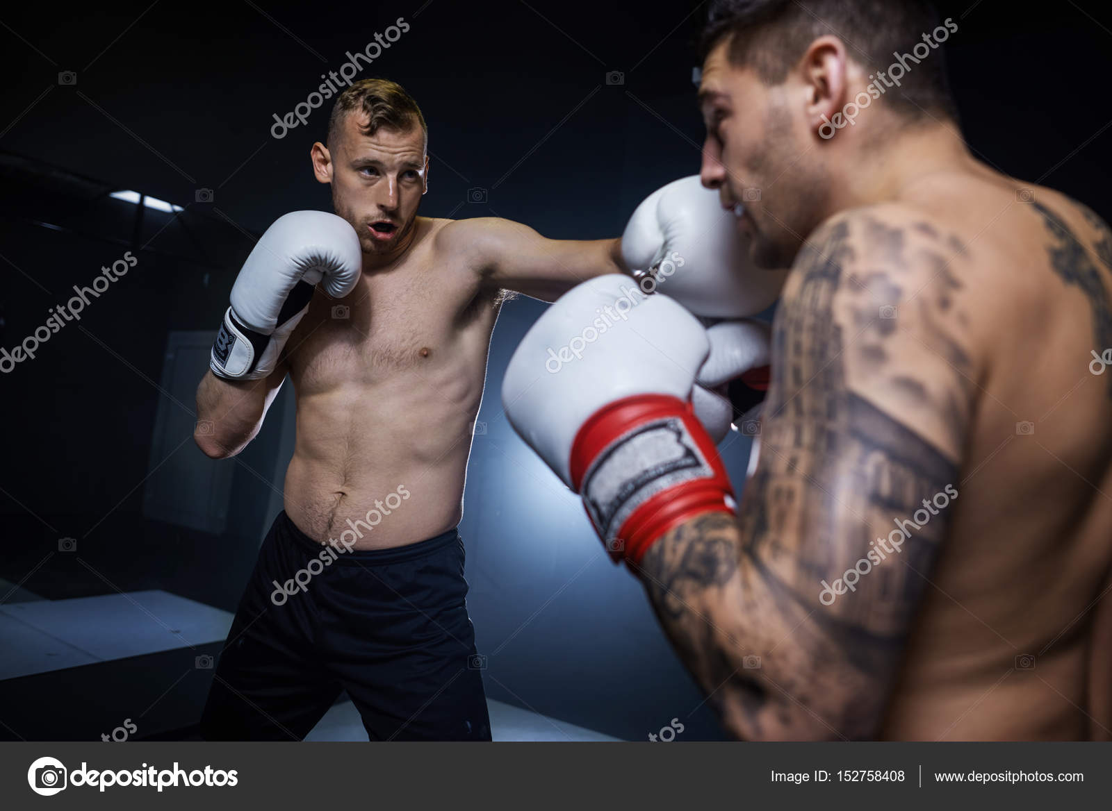 Two men boxing — Stock Photo © gpointstudio #152758408