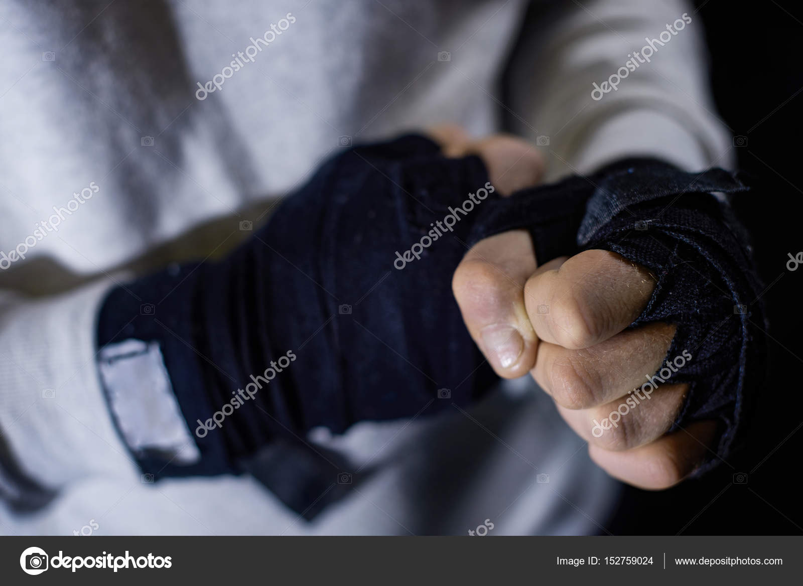 Hands of young kickboxer Stock Photo by ©gpointstudio 152759024