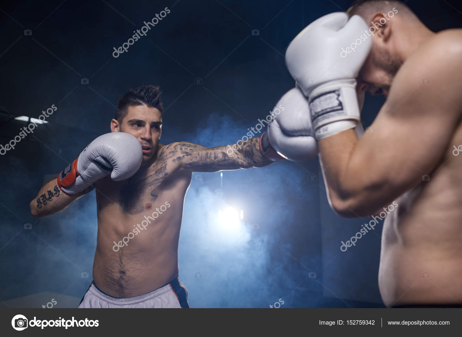 Two men boxing — Stock Photo © gpointstudio #152759342