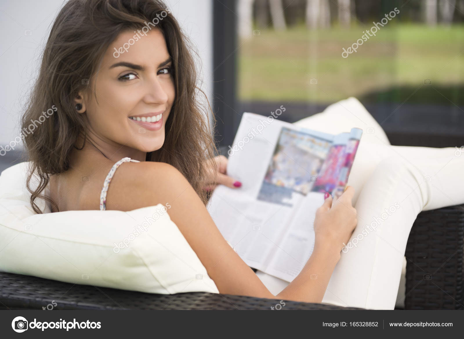 Woman holding magazine Stock Photo by ©gpointstudio 165328852 Woman holding magazine Stock Photo by ©gpointstudio 165328852