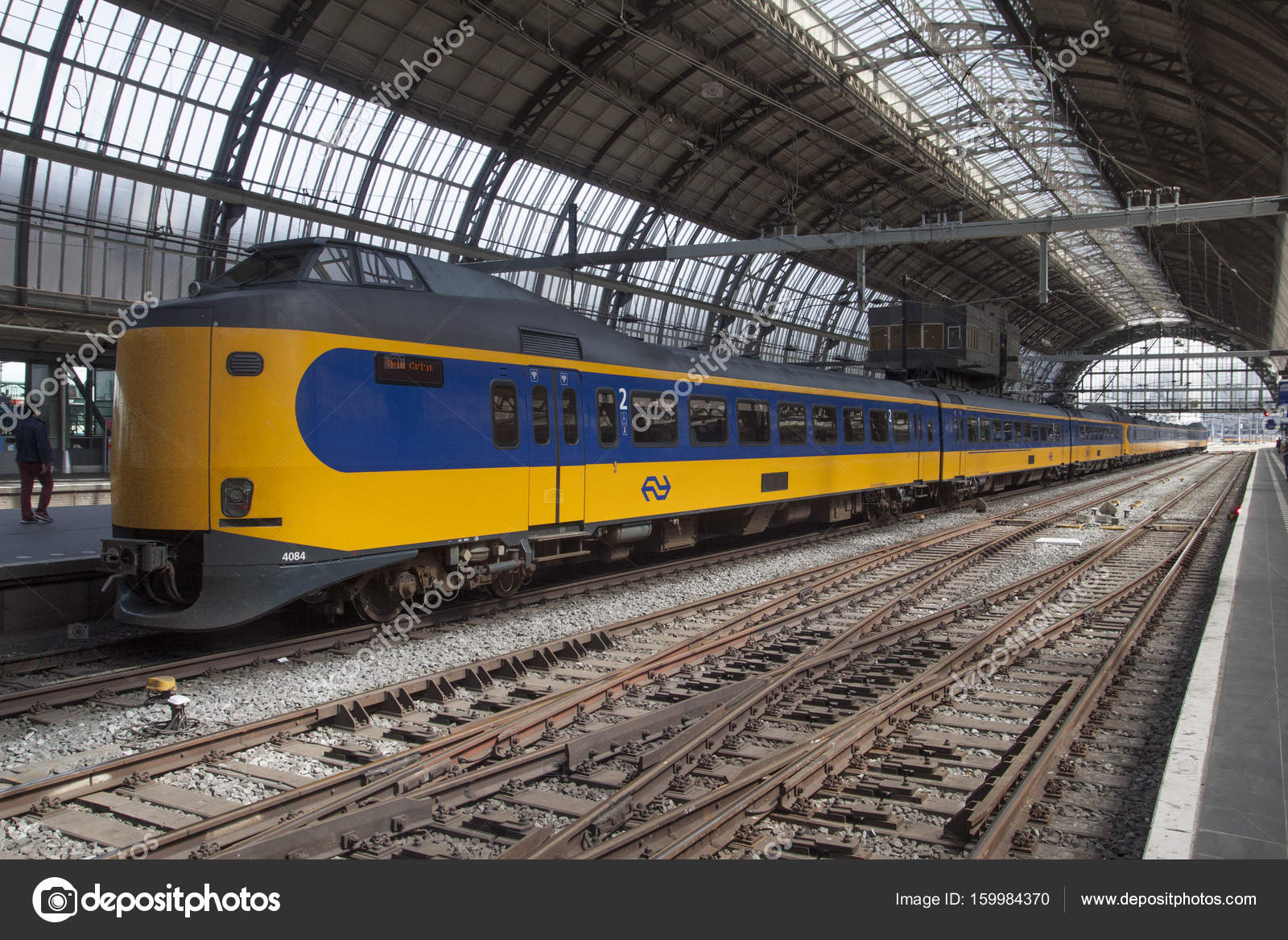 50/5000 Blue with yellow train of Dutch railways — Stock Editorial ...
