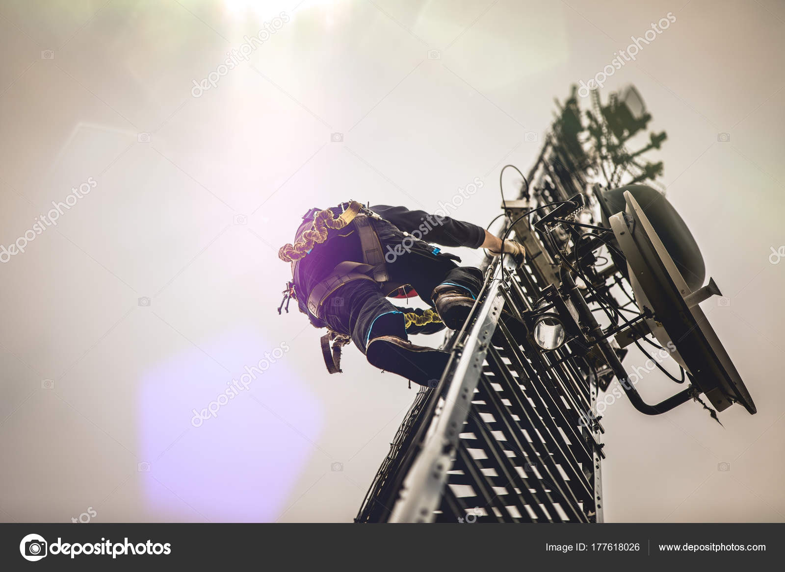 Telecom Worker Climbing Antenna Tower — Stock Photo © aetb #177618026
