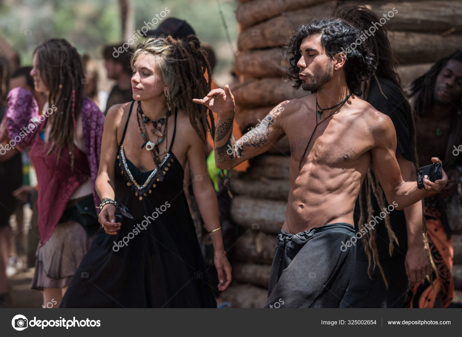 People dancing on the main stage of the psytrance Lost Theory festival ...