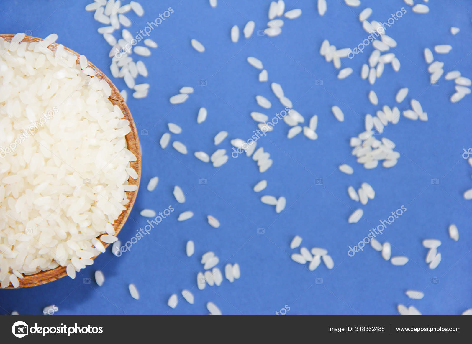 Natural fresh white round rice in a decorative wooden plate ⬇ Stock ...