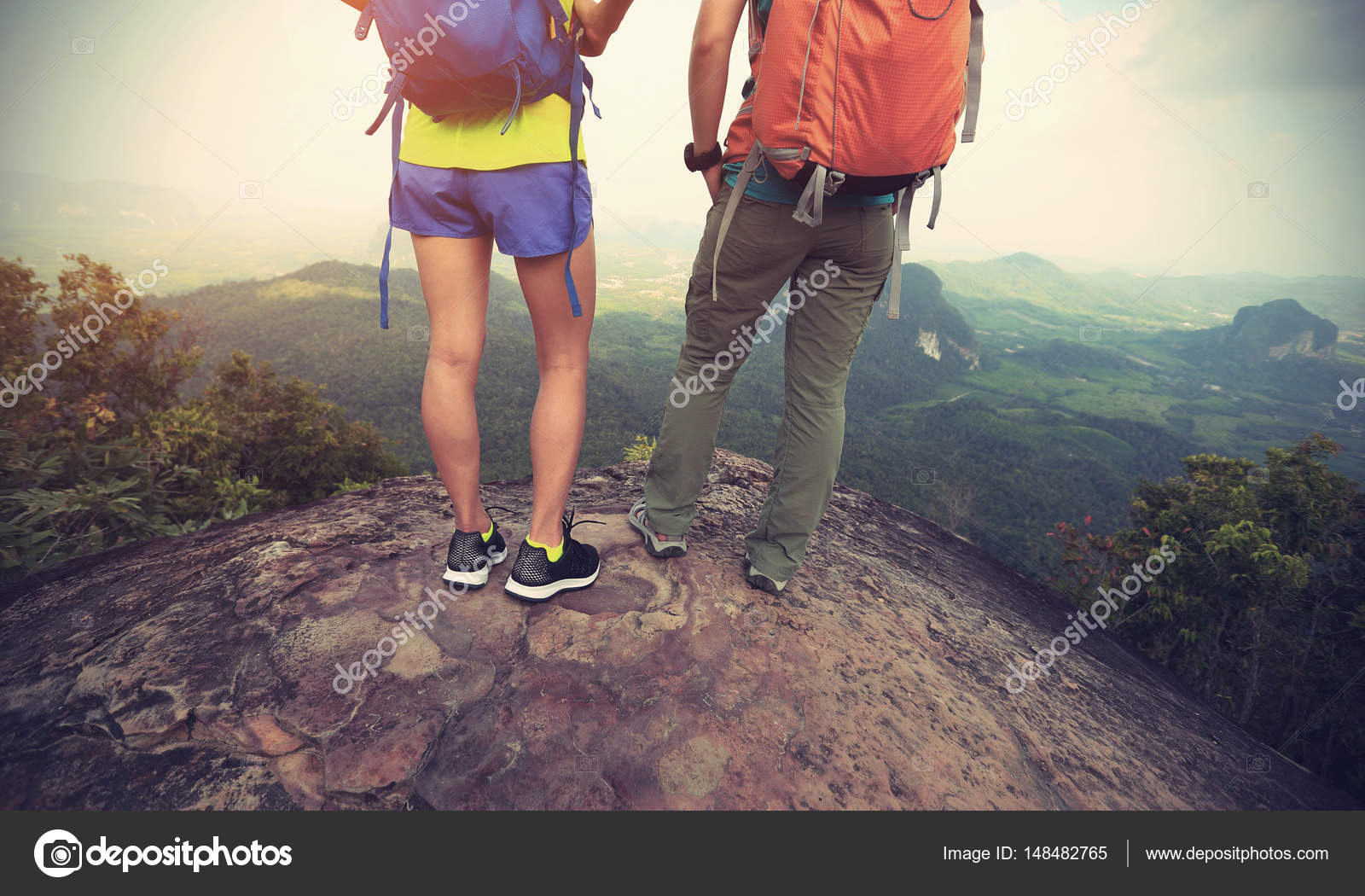 Two hikers standing at mountain top — Stock Photo © lzf #148482765