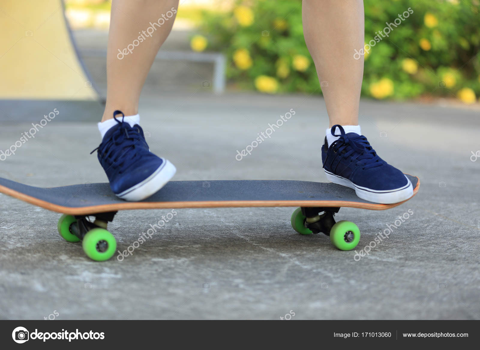 Skateboarder legs riding at skatepark — Stock Photo © lzf #171013060