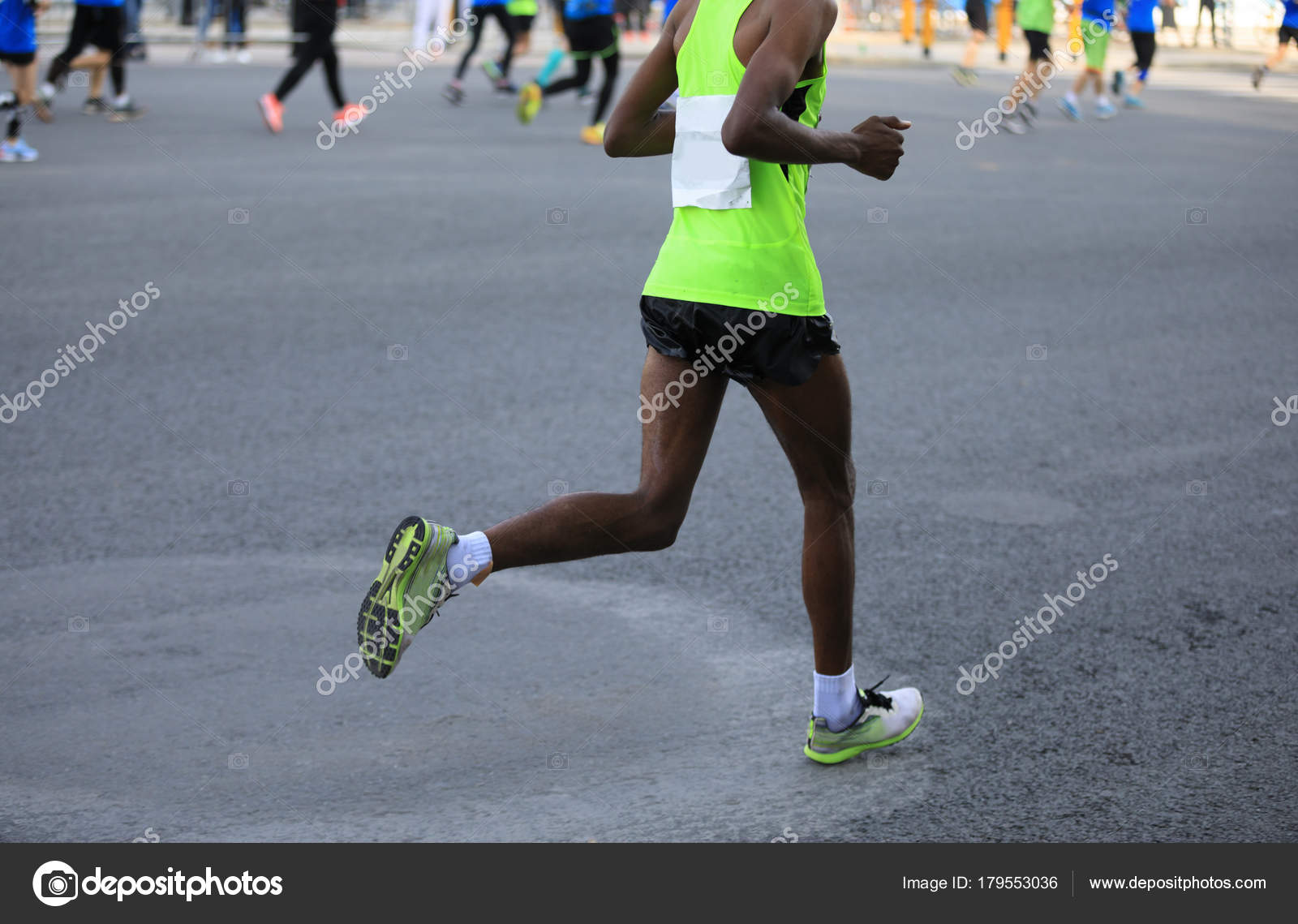 Marathon Runner Legs Running City Road Stock Photo by ©lzf 179553036