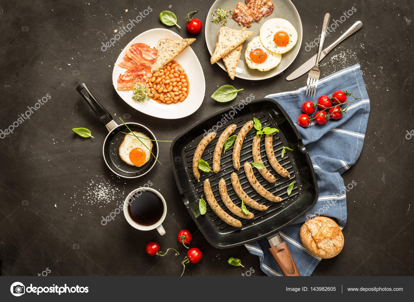 Full english breakfast on black chalkboard background Stock Photo by ...