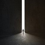 A man walking through a narrow pathway Stock Photo by ©kevron2002 30835835