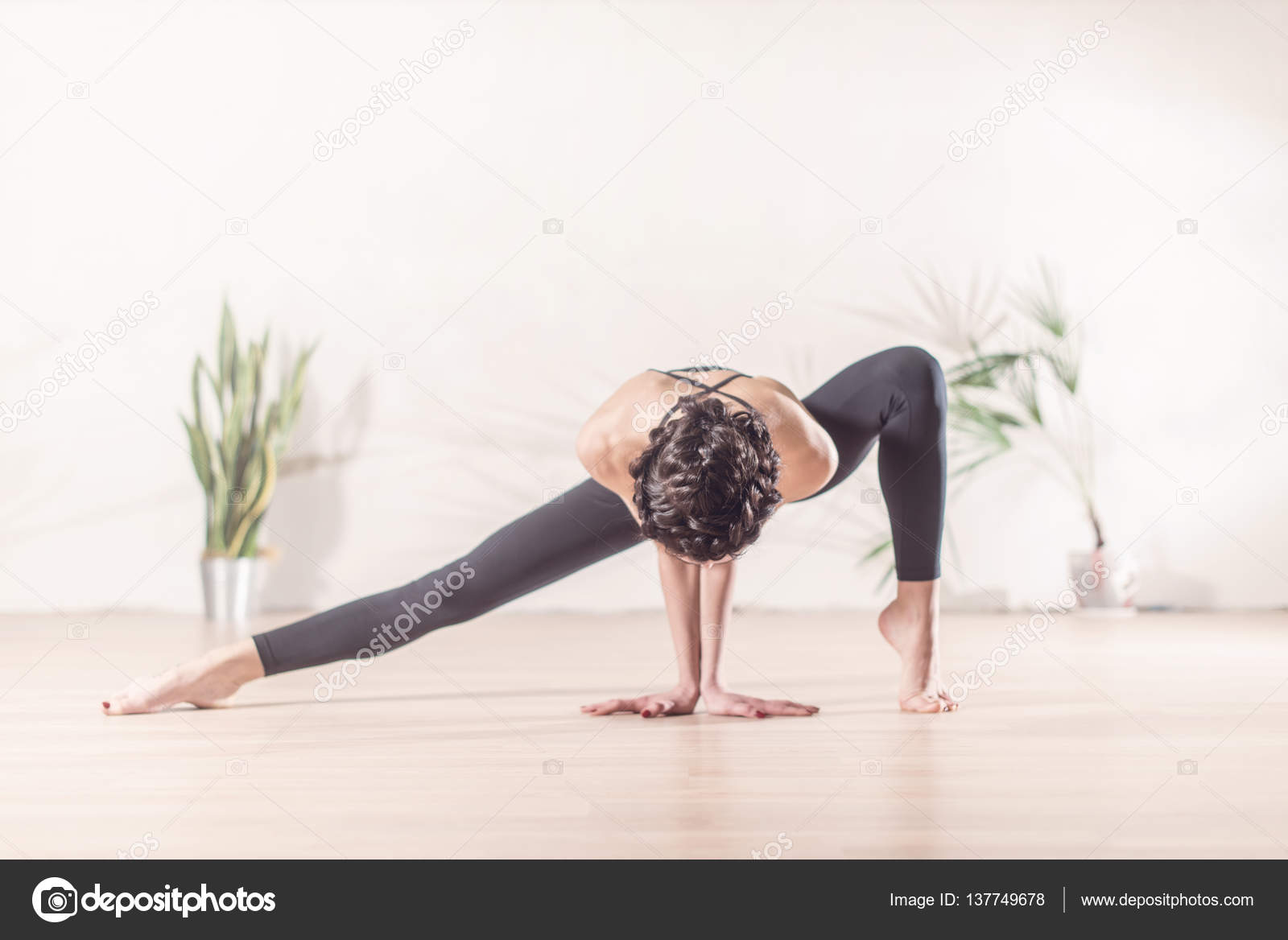 Fit modern dancer standing gracefully on tiptoe Stock Photo by ©undrey ...
