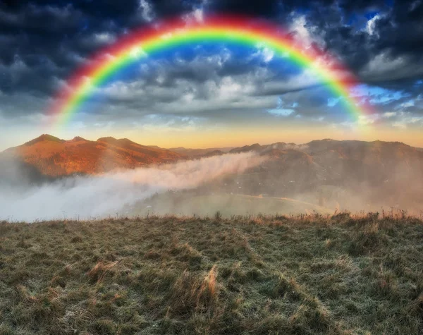 Rainbow over mountains Stock Photos, Royalty Free Rainbow over ...