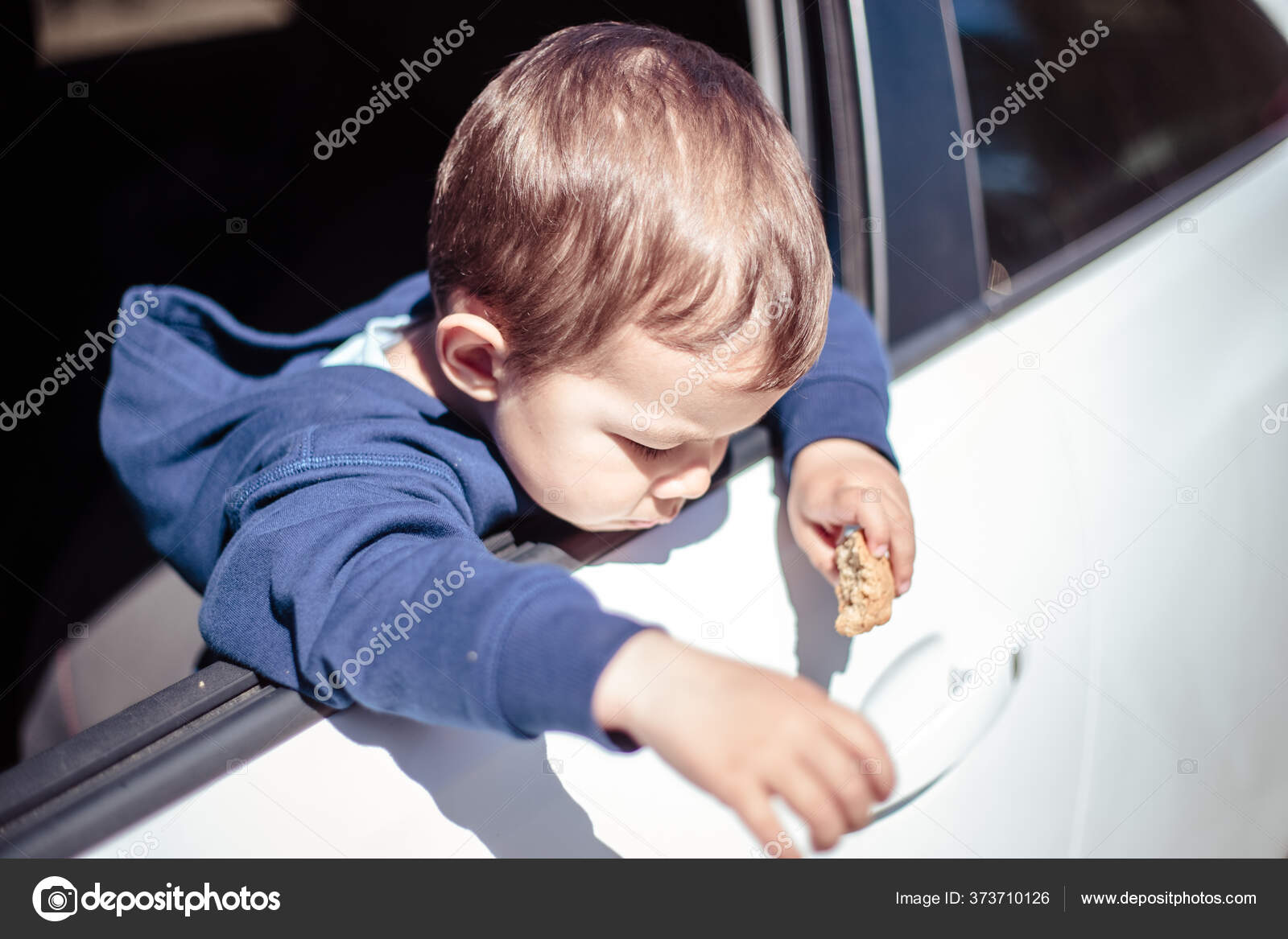 Little Boy Peeps Out Car Window Stock Photo by ©cherry_daria 373710126