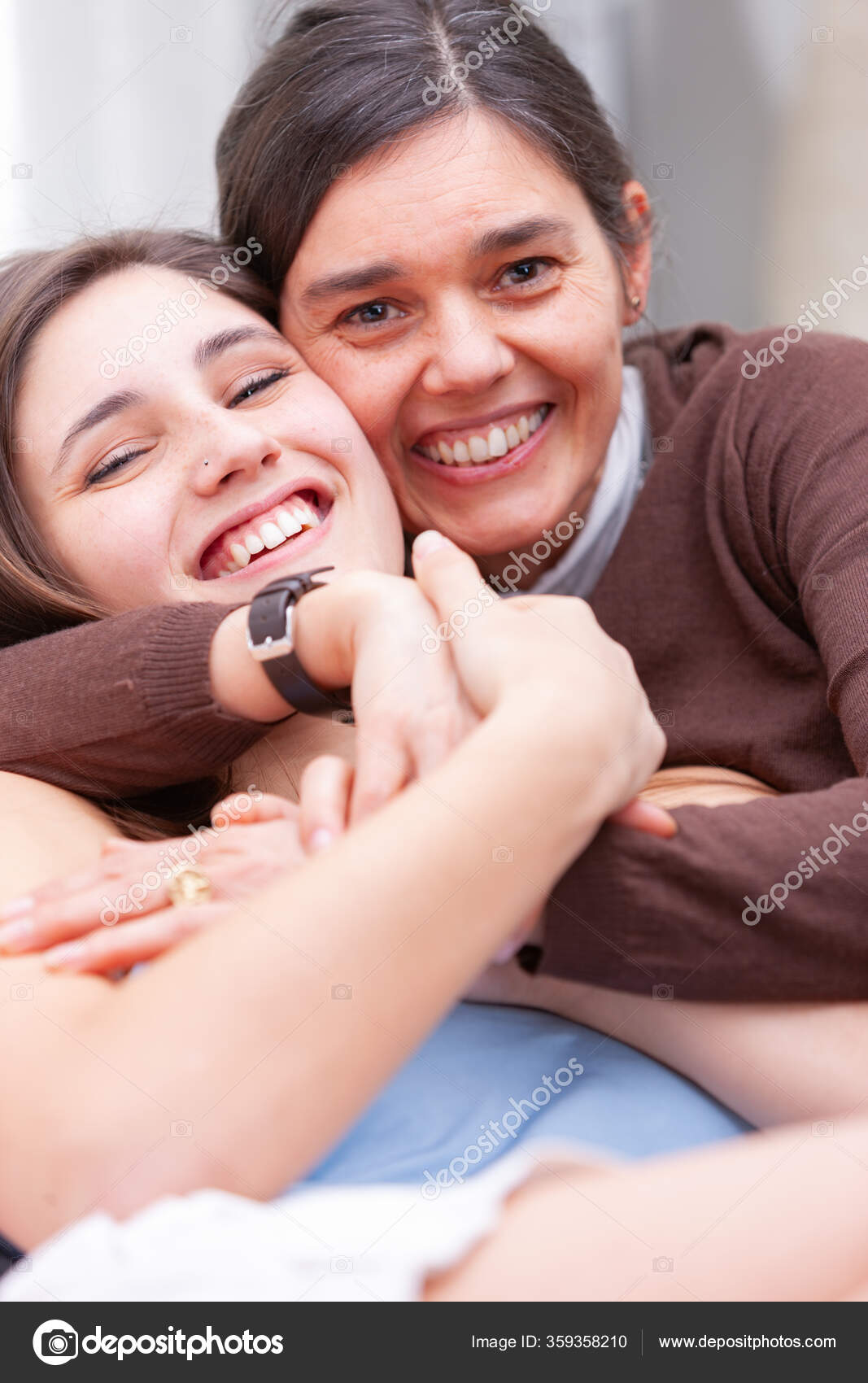 Happy Loving Laughing Mother Daughter Hugging Cuddle Close Together ...