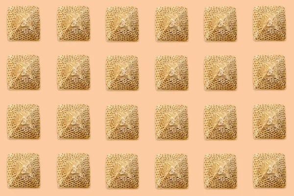 Pattern of golden sand pyramids on a beige background. Minimal tourism ...