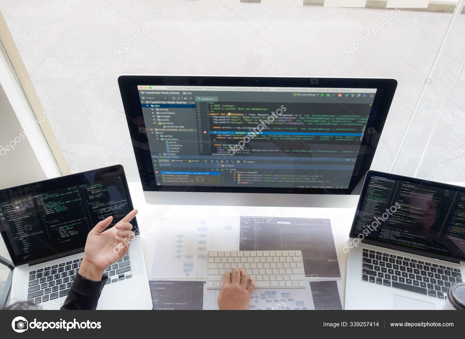 Programmers work on the development of coding and coding technol ...