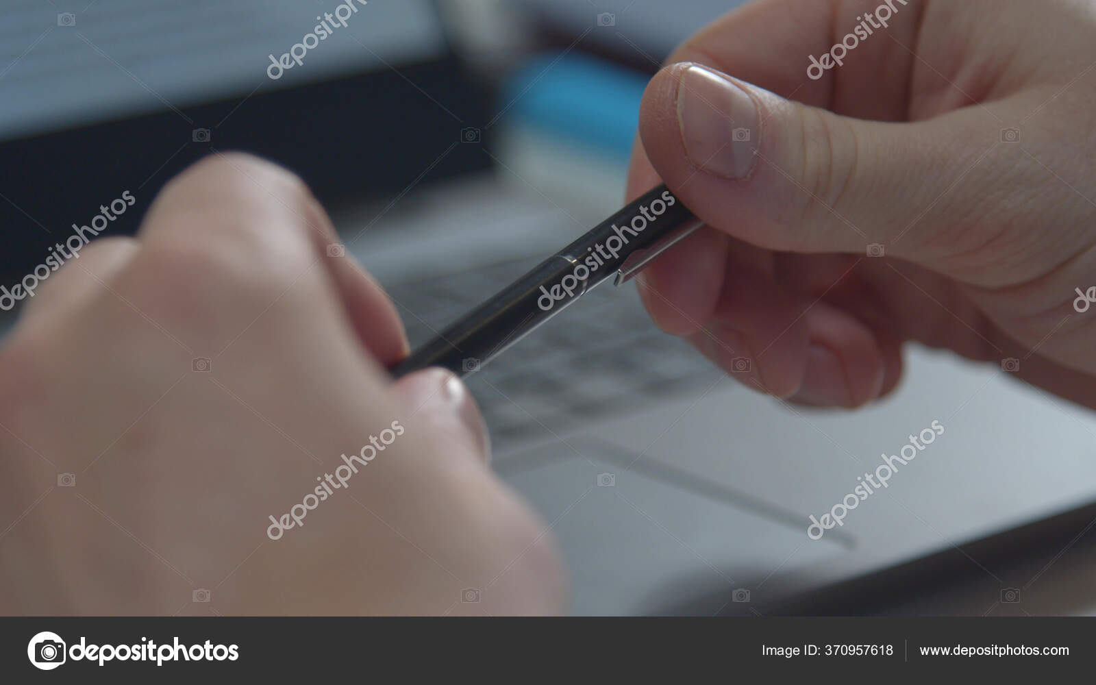 A man rotates a pen in his hand. Extreme close-up — Stock Photo ...