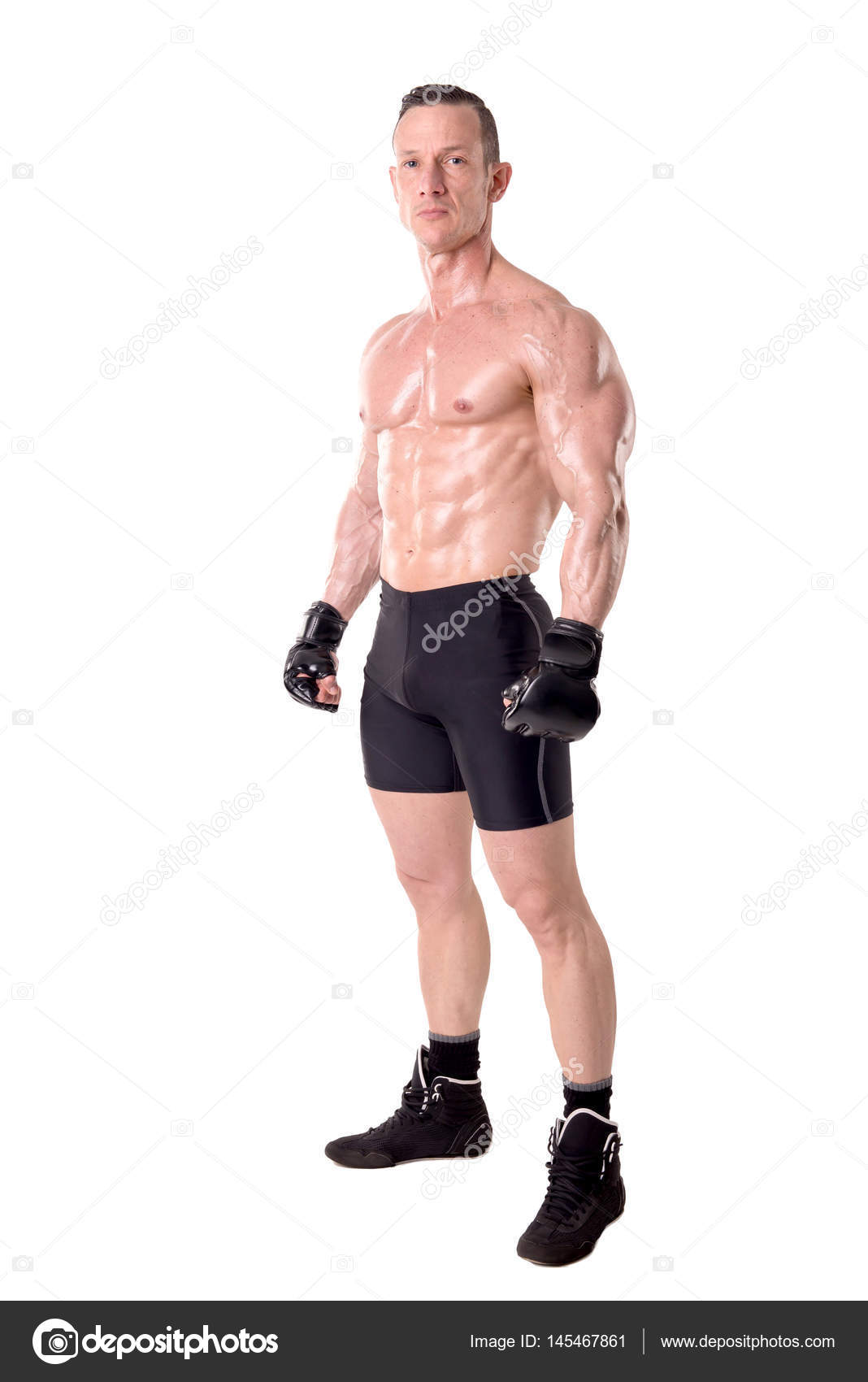 Fighter posing with gloves — Stock Photo © verkoka #145467861