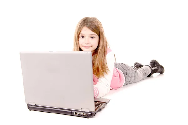 Little girl with computer Stock Photo by ©verkoka 145470113