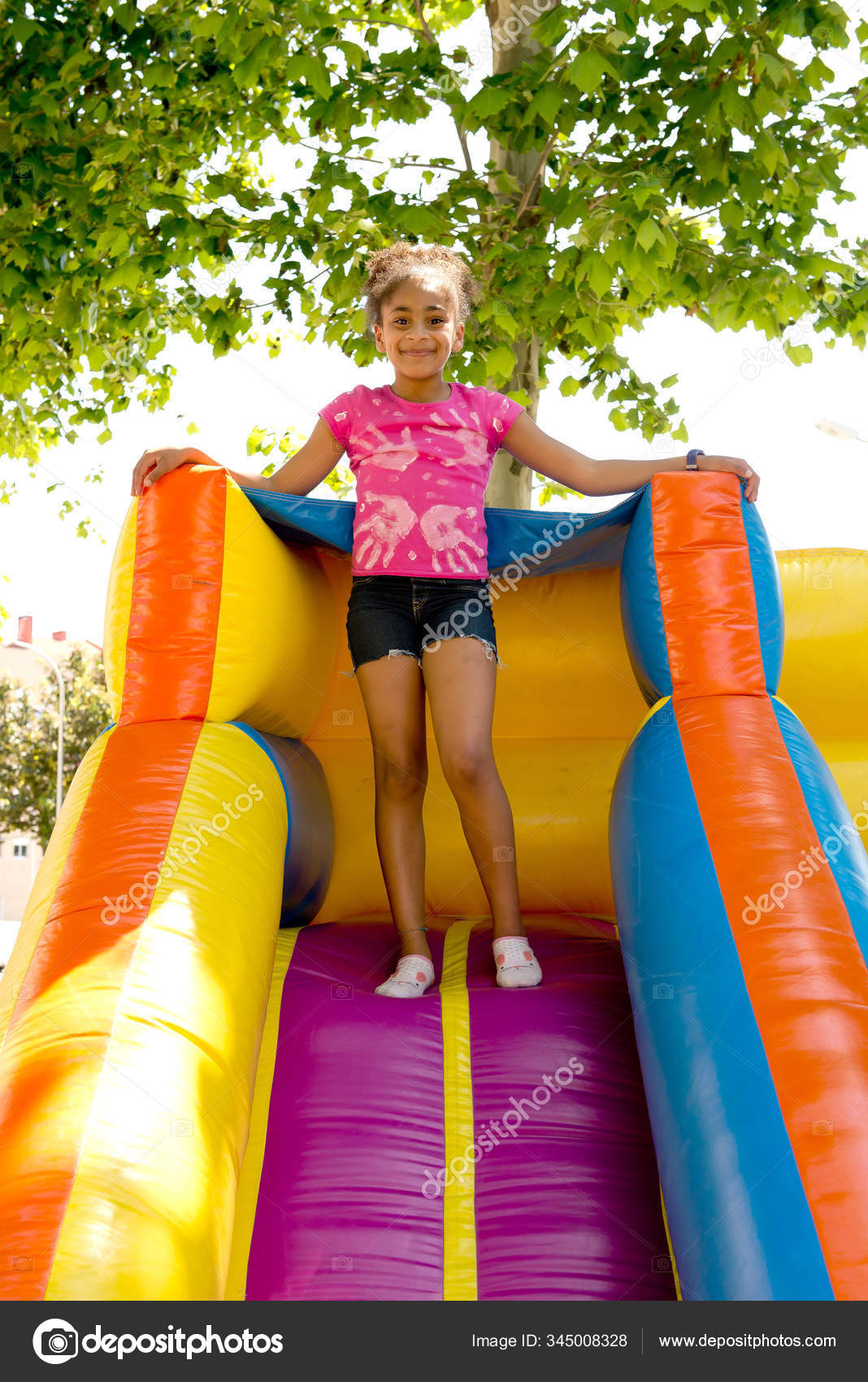 Kids playing outside Stock Photo by ©verkoka 345008328