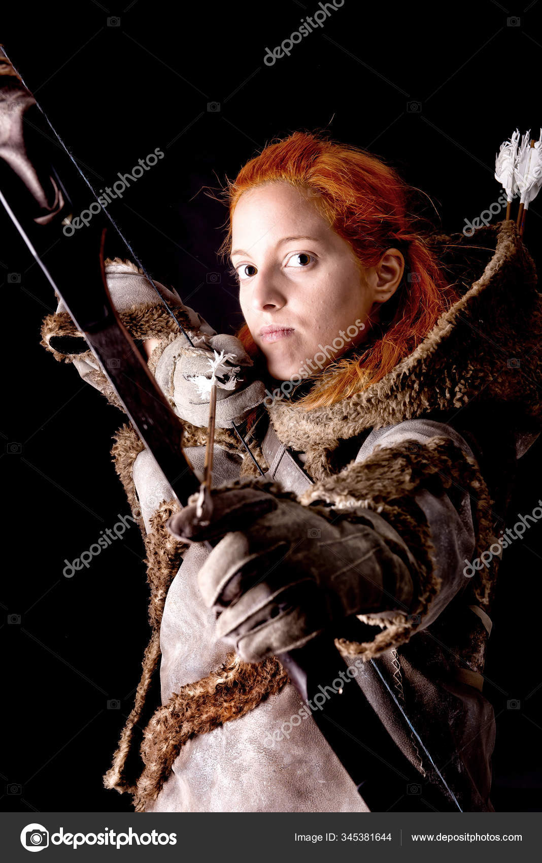 Female archer posing — Stock Photo © verkoka #345381644