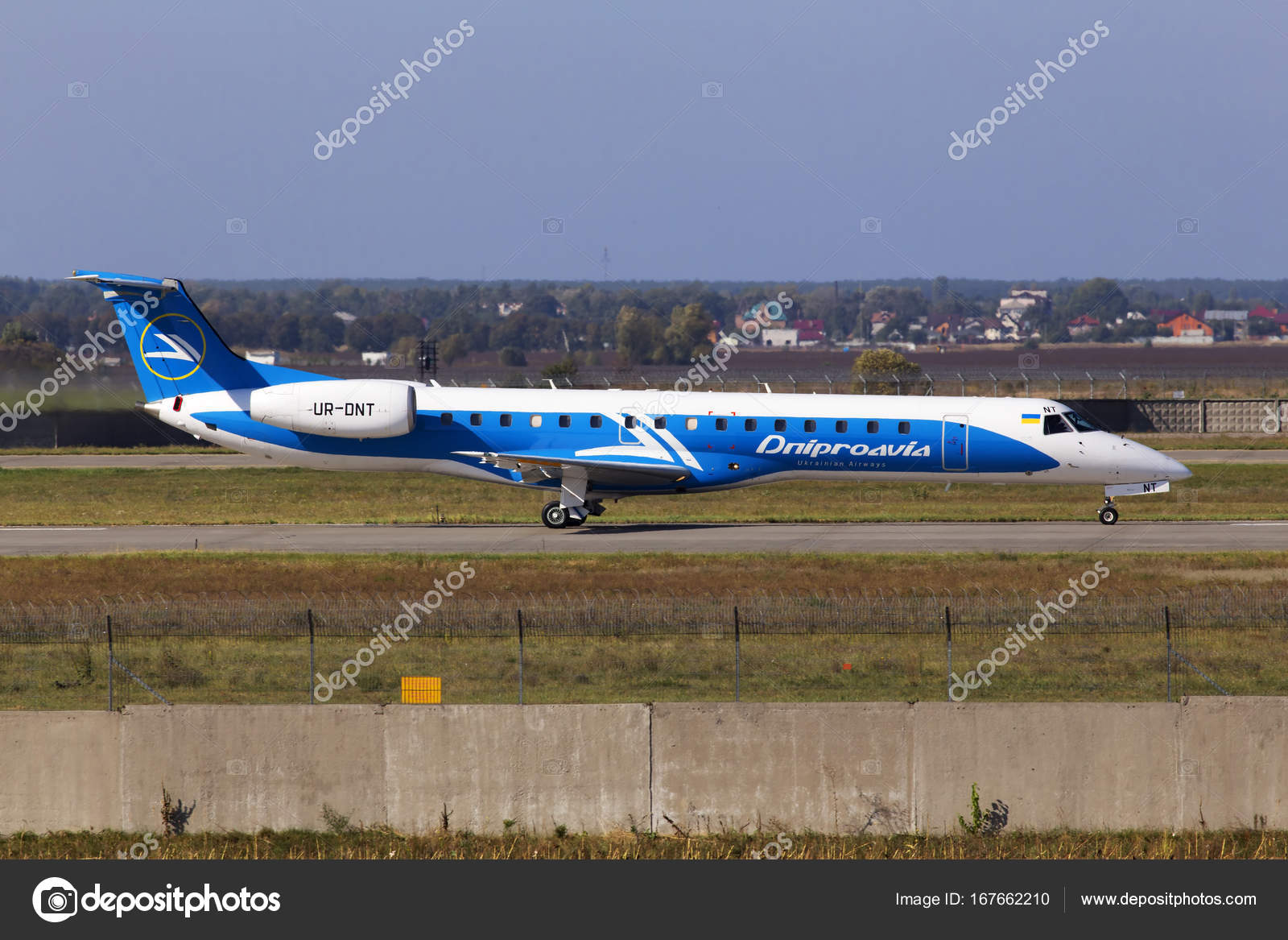 Dniproavia Embraer ERJ-145 aircraft preparing for take-off from the ...