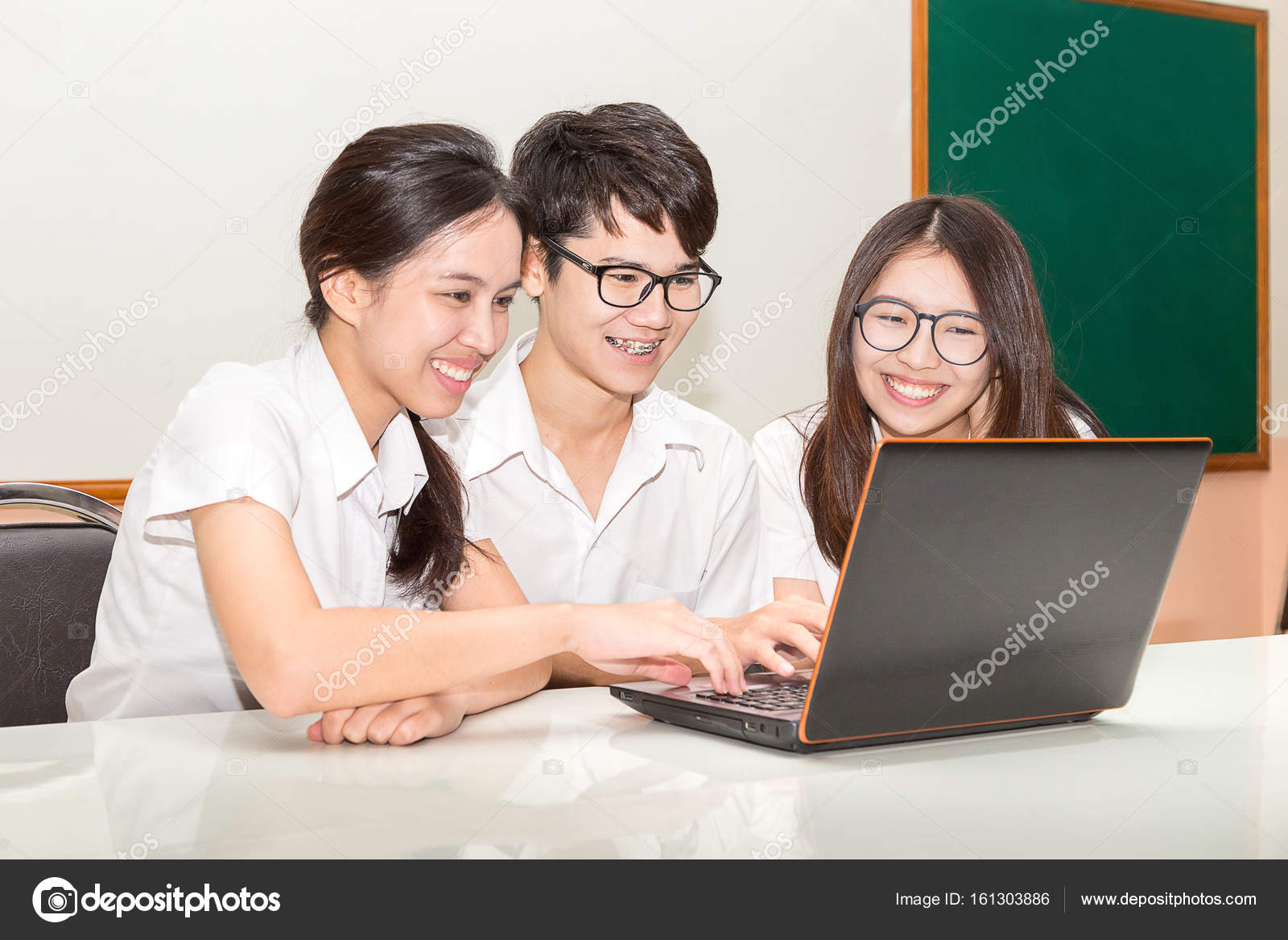Group of young asian student happy in study with computer in classroom ...