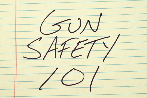 Gun Safety 101 On A Yellow Legal Pad - Stock Image - Everypixel