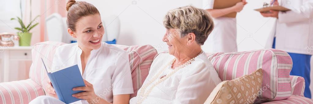 Senior woman and professional carer — Stock Photo © photographee.eu ...