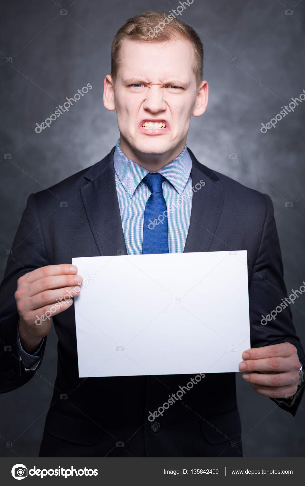 Nervous man in a suit — Stock Photo © photographee.eu #135842400