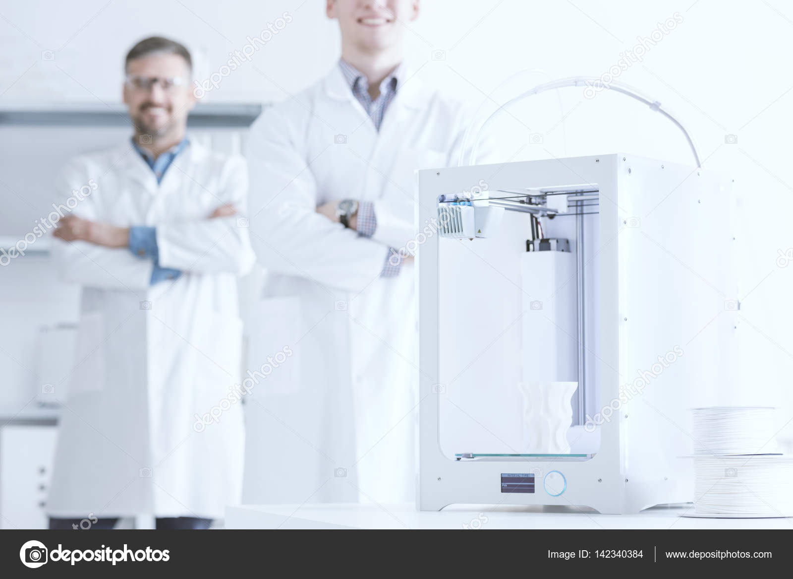 3d printer and scientist team Stock Photo by ©photographee.eu 142340384