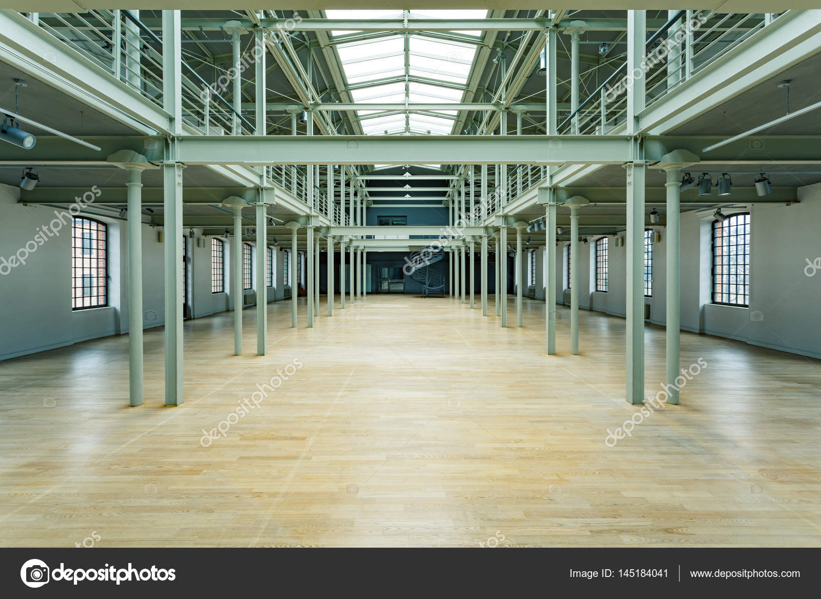 Empty storage depot with windows — Stock Photo © photographee.eu #145184041
