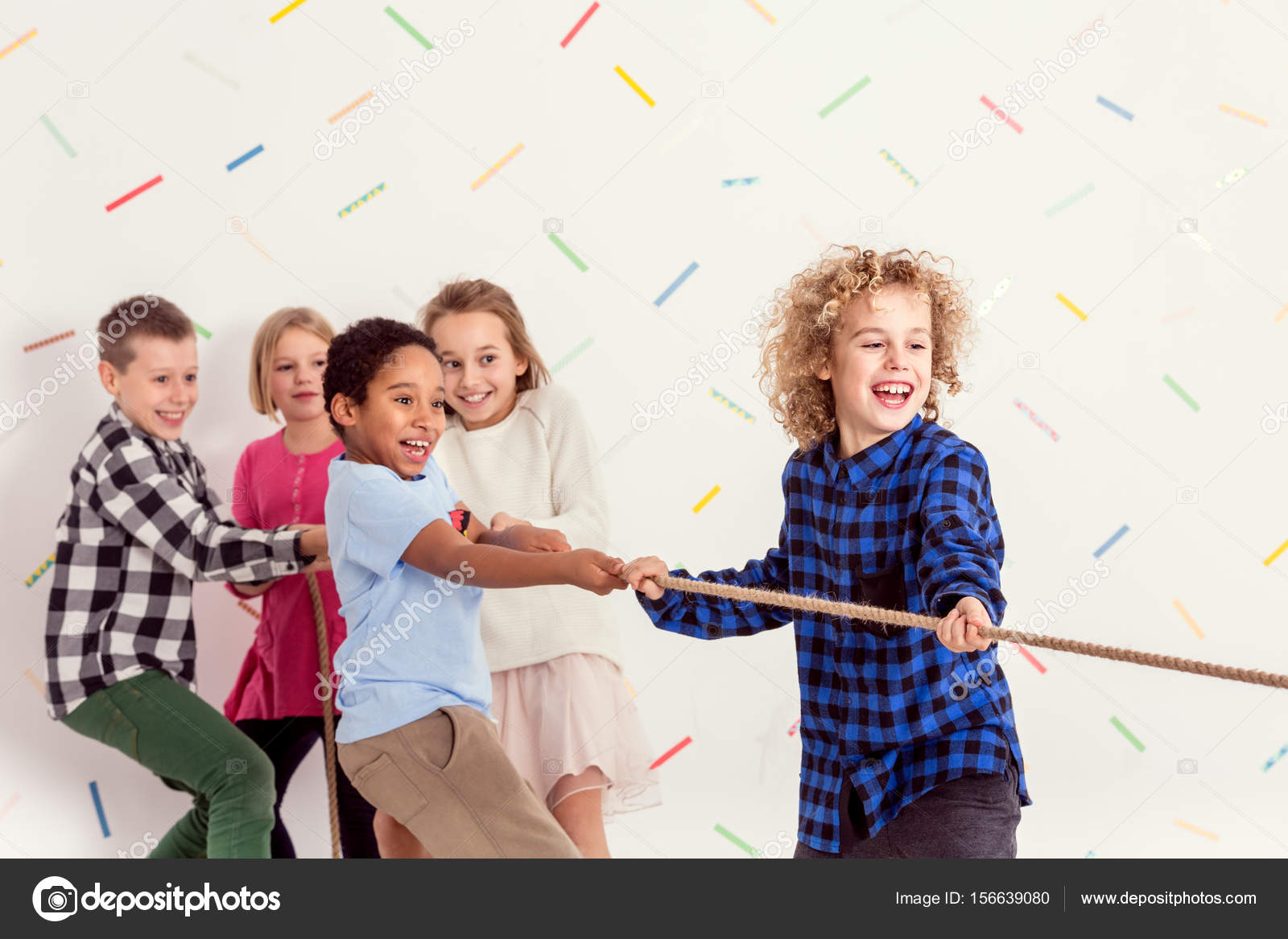Kids pulling a rope Stock Photo by ©photographee.eu 156639080