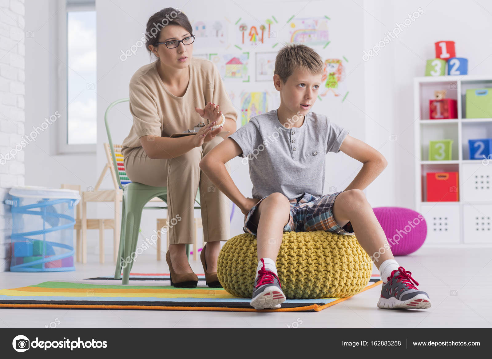 Child turning back on therapist — Stock Photo © photographee.eu #162883258