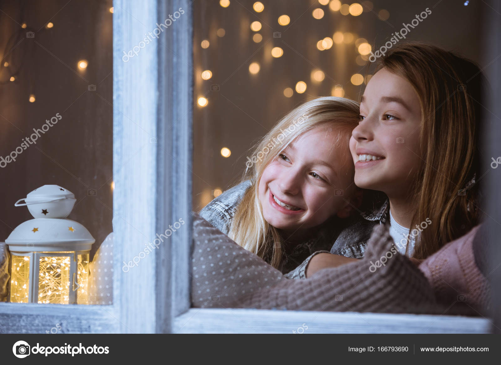 Friends looking out the window Stock Photo by ©photographee.eu 166793690