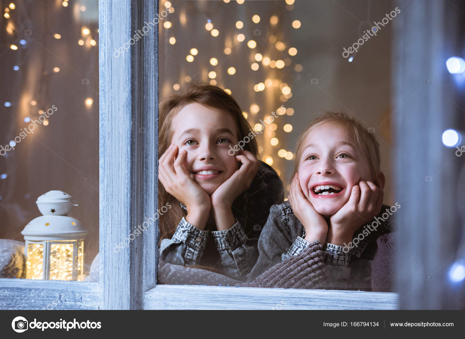 Children looking out the window Stock Photo by ©photographee.eu 166794134