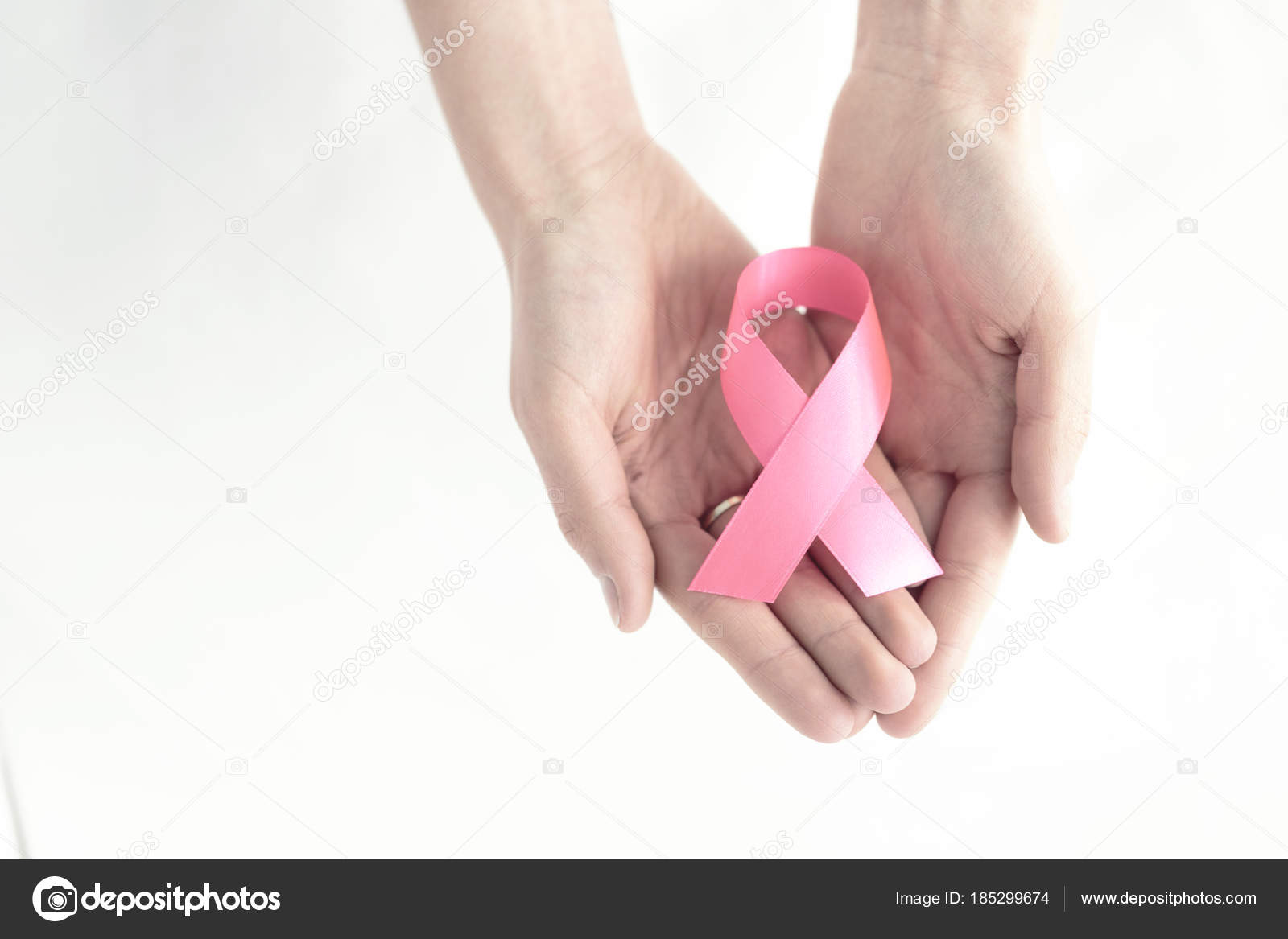 Hands with pink ribbon Stock Photo by ©photographee.eu 185299674