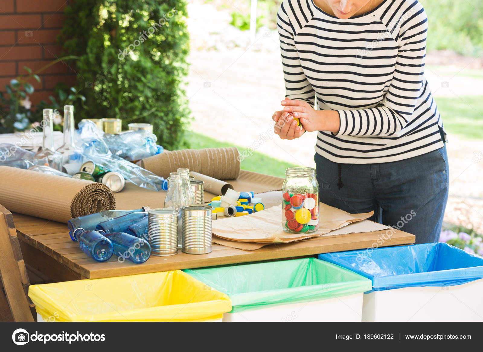 Person segregating waste on terrace — Stock Photo © photographee.eu ...